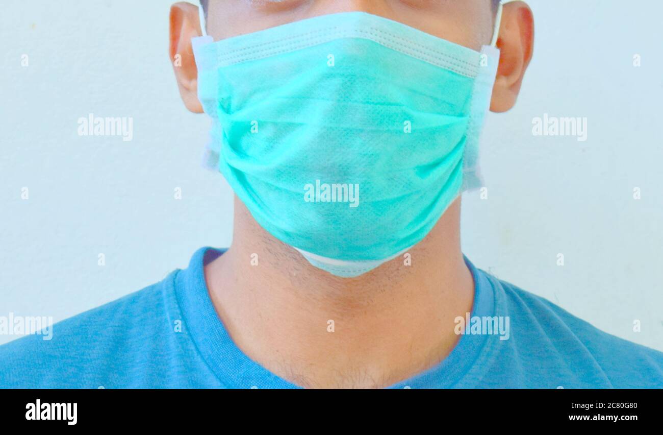 Doctor wearing a face mask for treating covid 19 close up Stock Photo ...