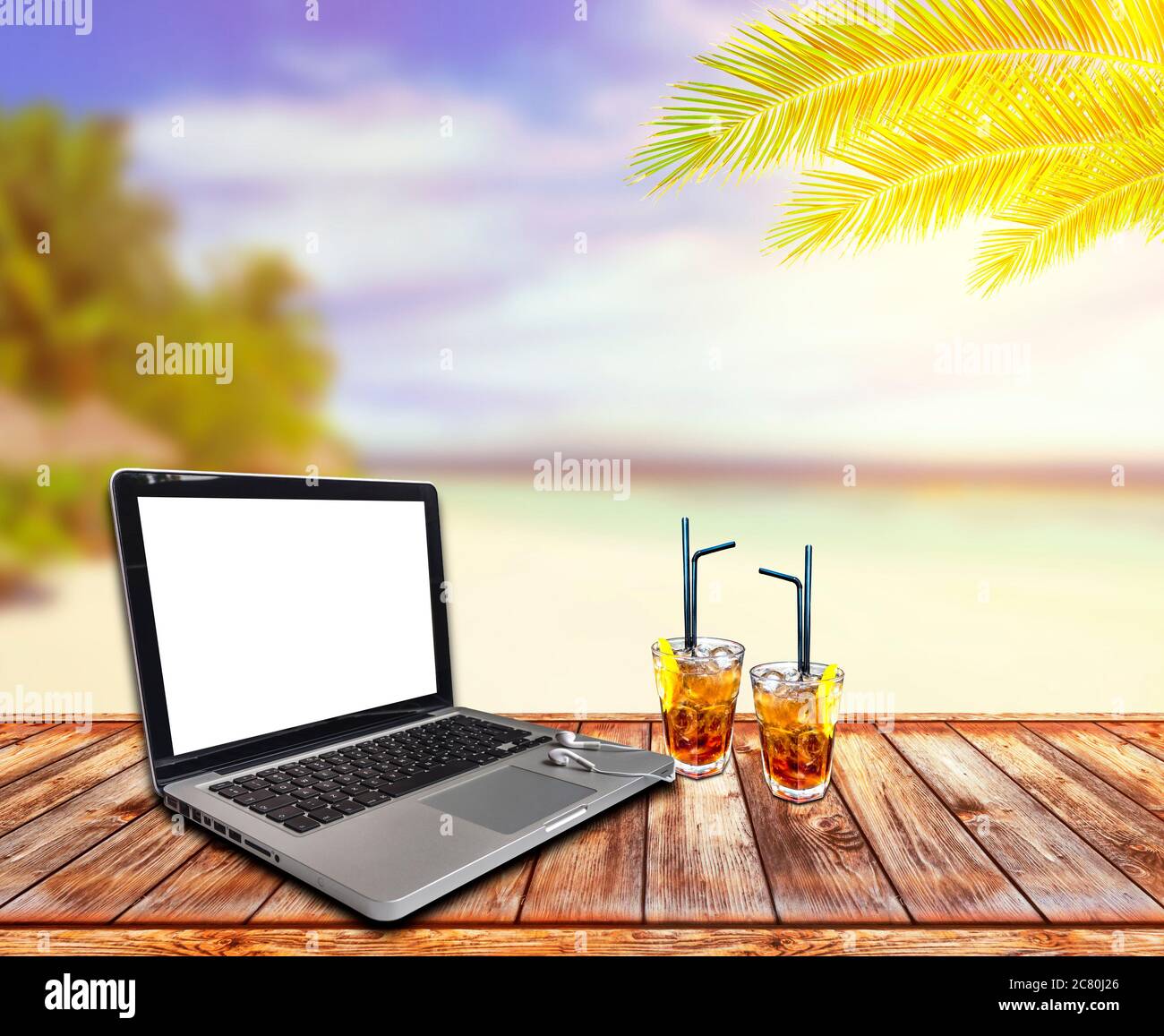 Laptop screen on wooden bench at the beach Stock Photo - Alamy