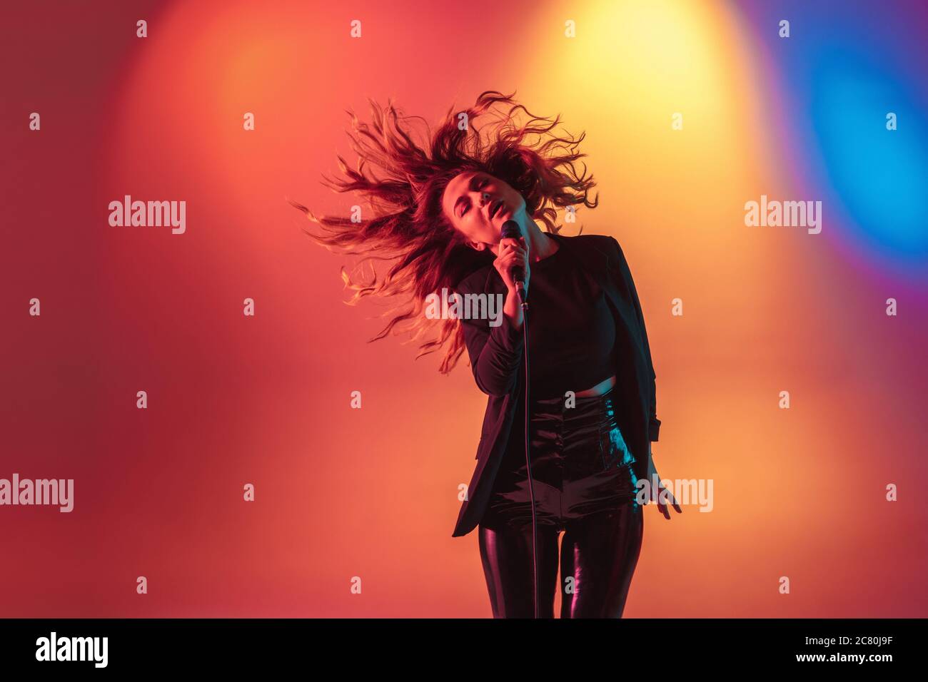 Elegance. Young caucasian inspired and expressive musician, female ...