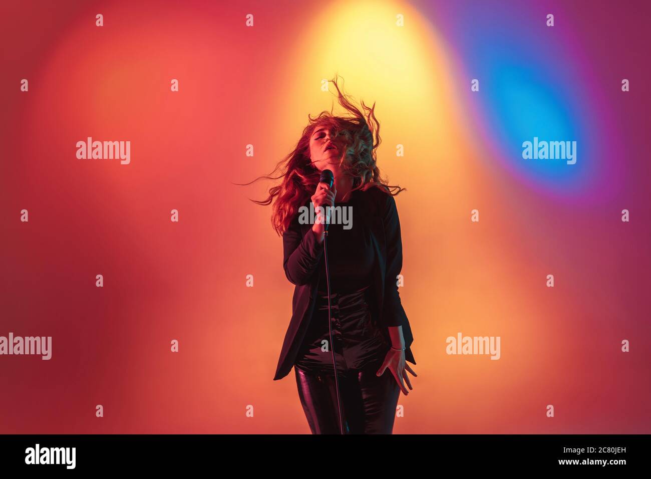 Elegance. Young caucasian inspired and expressive musician, female ...