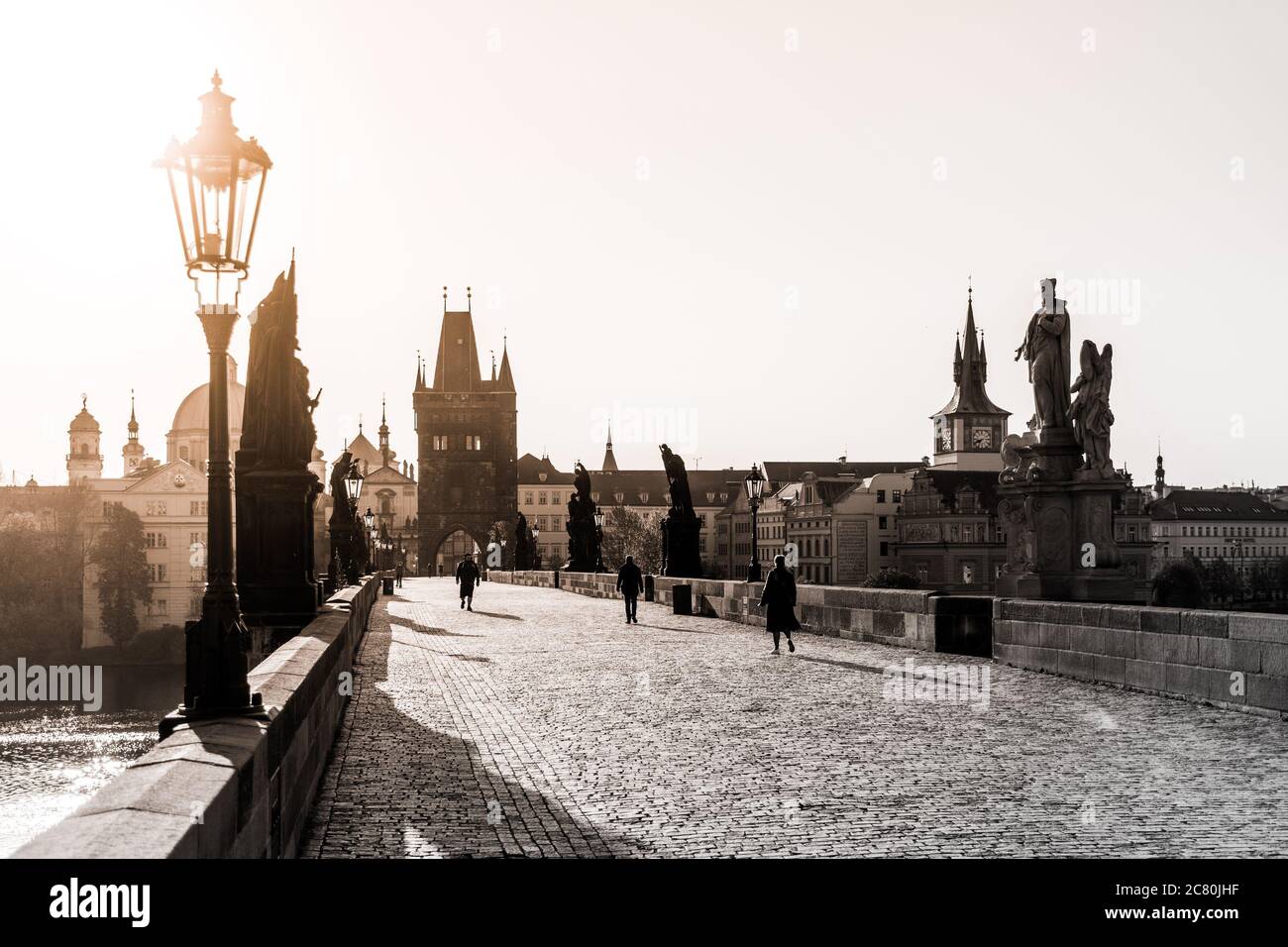 Morning on CHarles Bridge, Czech: Karluv most. Hazy sunrise daybreak. Praha, Czech Republic ...