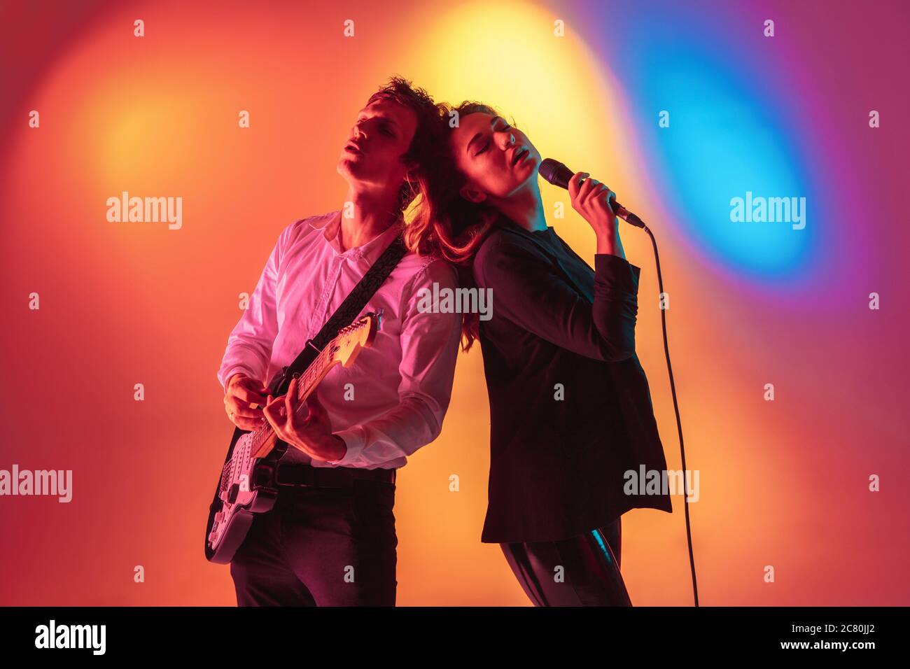 Young caucasian inspired and expressive musician, female singer and ...