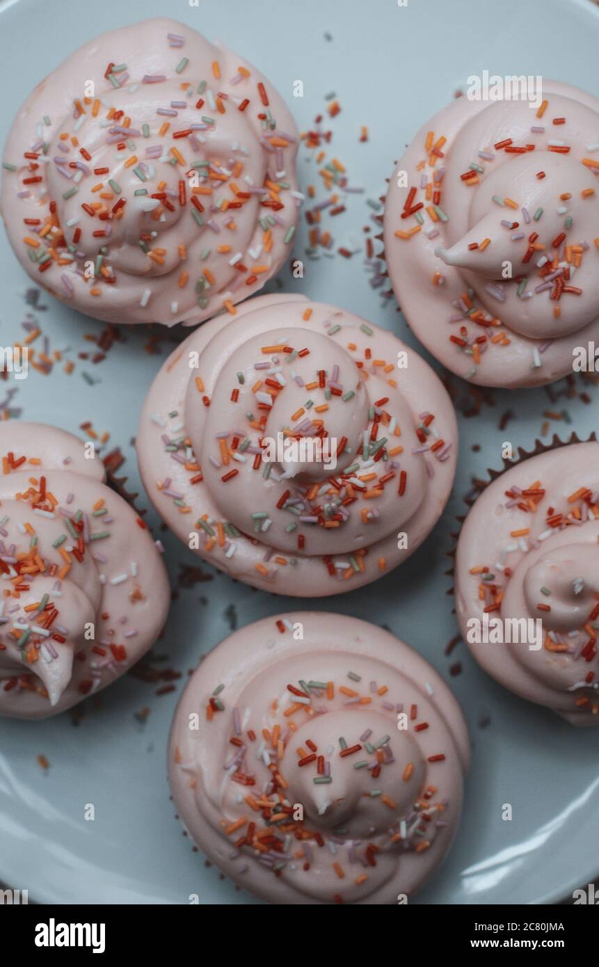 Vertical shot of chocolate cupcakes with a sprinkle toppings Stock ...