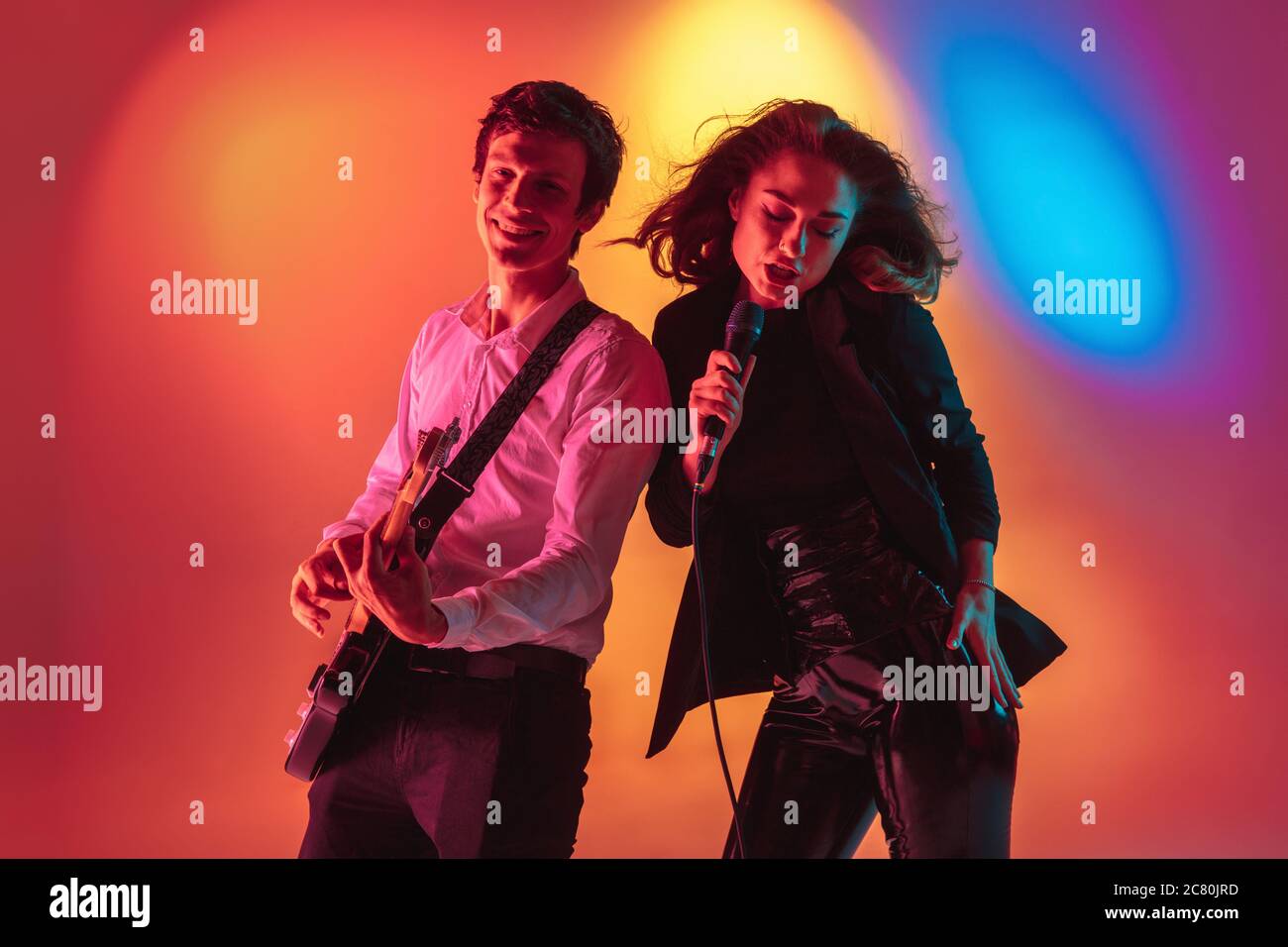 Young caucasian inspired and expressive musician, female singer and ...