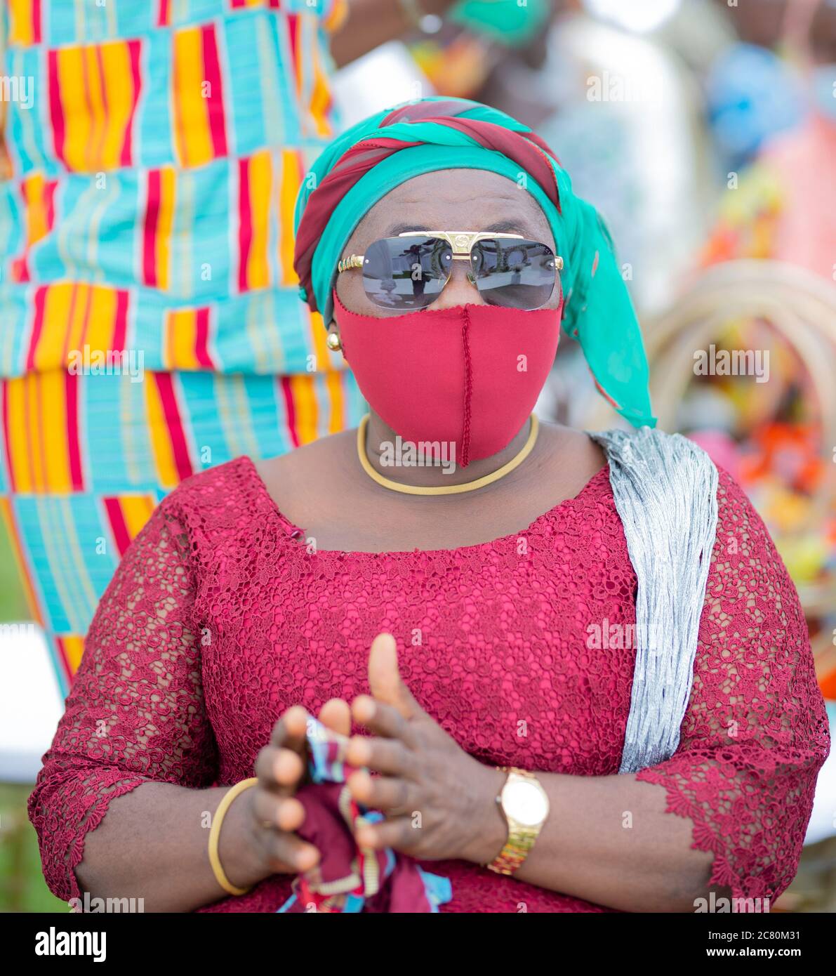 A wedding ceremony held with social distancing and people wearing mask ...
