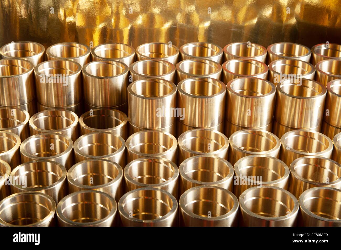 Engineering and metalworking technologies. New brass cylinders Stock ...