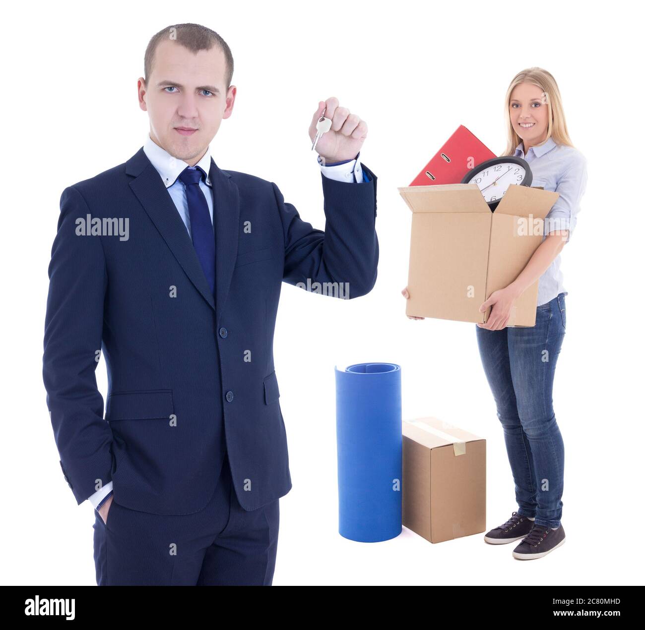 moving day concept - businessman real estate agent giving key to woman ...