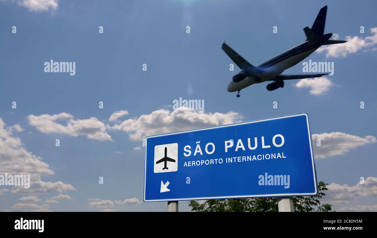 Airplane silhouette landing in Sao Paulo, Brazil, São Paulo. City ...