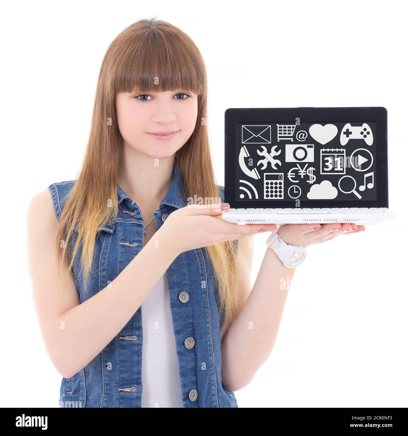 software concept - cute teenage girl holding laptop with multimedia ...