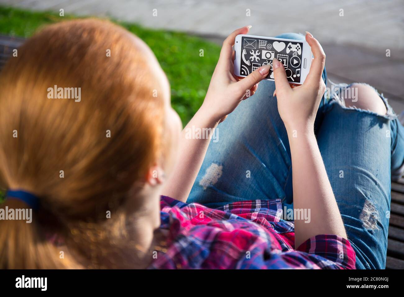 technology concept - smart phone with different applications in teenage ...