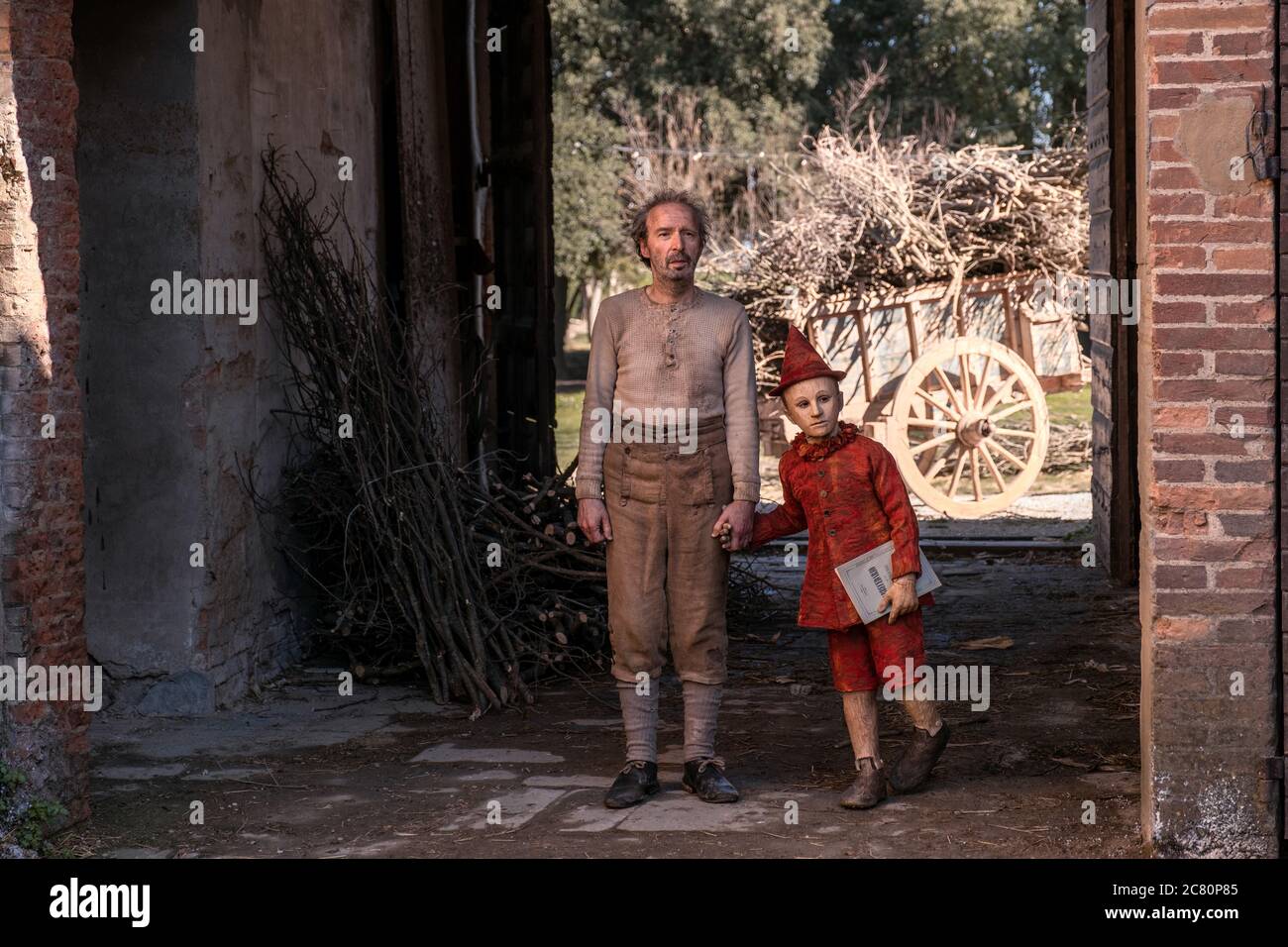 ROBERTO BENIGNI and FEDERICO IELAPI in PINOCCHIO (2019), directed by ...