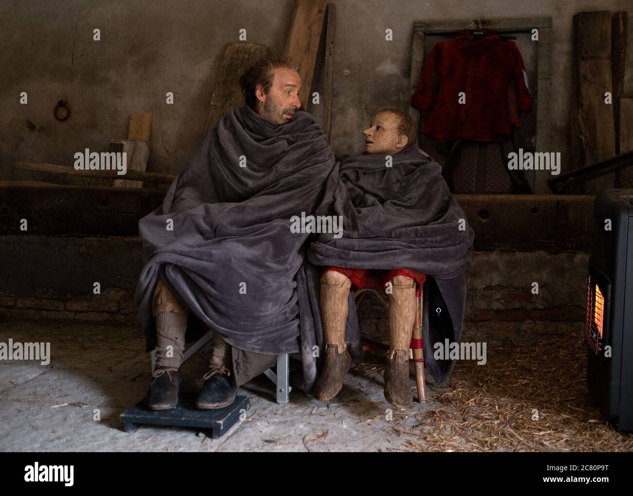 ROBERTO BENIGNI and FEDERICO IELAPI in PINOCCHIO (2019), directed by ...