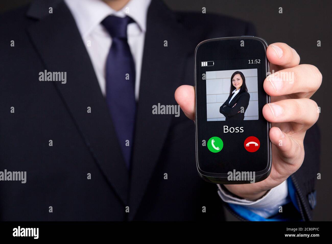 male hand holding smart phone with incoming boss call Stock Photo - Alamy