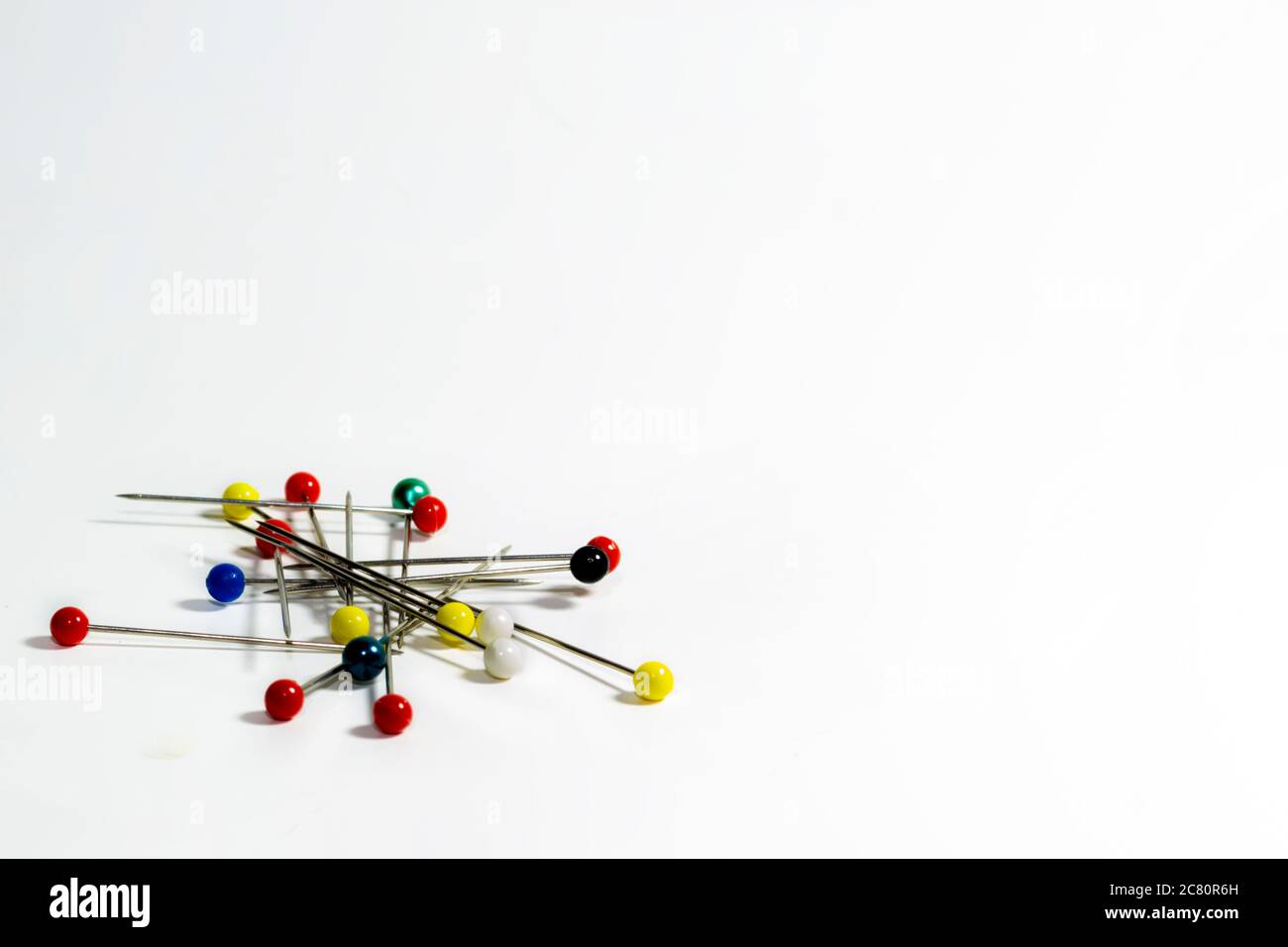 colored ball pins. white background different coloured pins Stock Photo ...