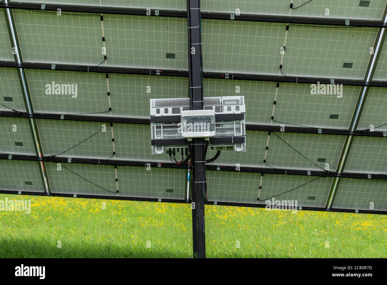 Back side view photovoltaics in solar power station Stock Photo - Alamy