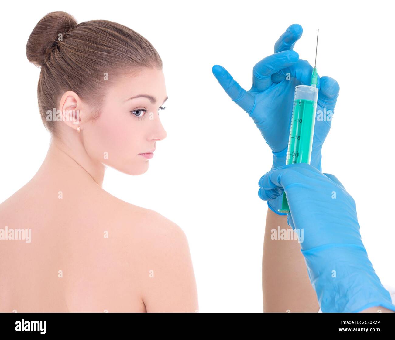 botox injection concept - hands with syringe and young beautiful woman ...