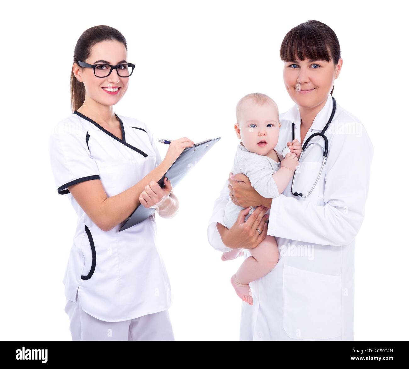 portrait of two female doctors pediatricians with little baby patient ...