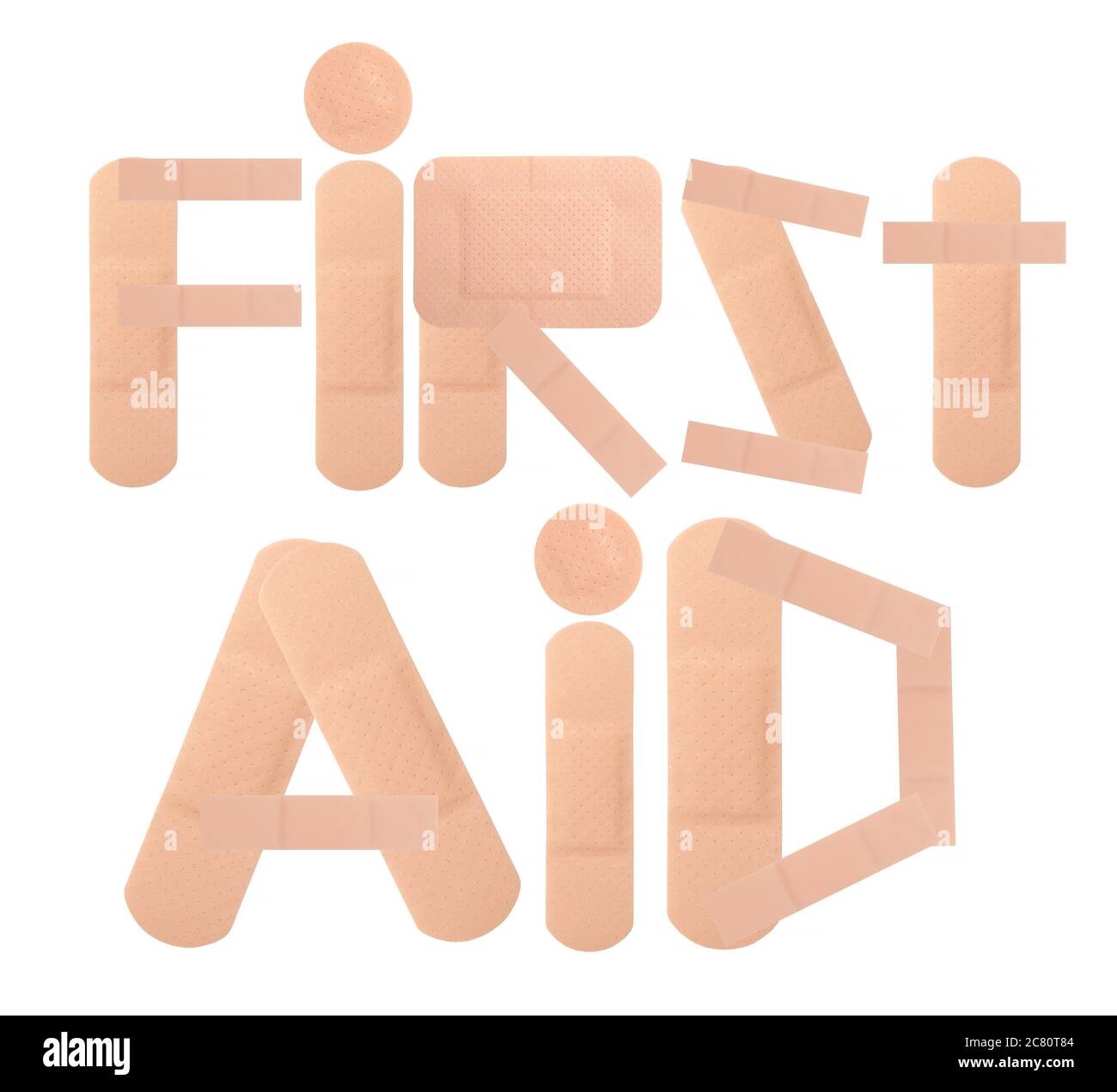 health care concept - text "first aid" written with adhesive plaster ...