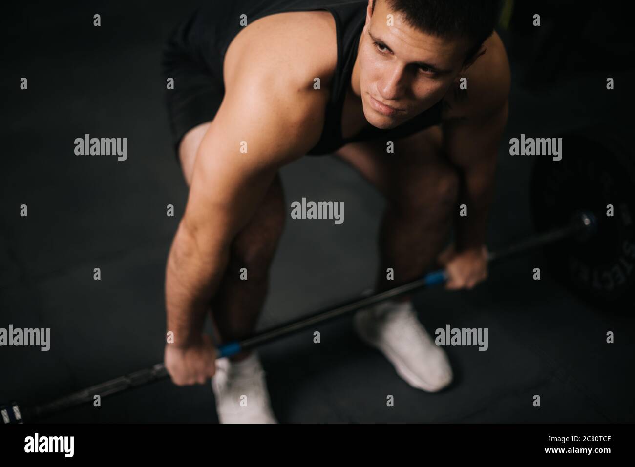 Portrait of Muscular strong man with perfect body wearing sportswear ...