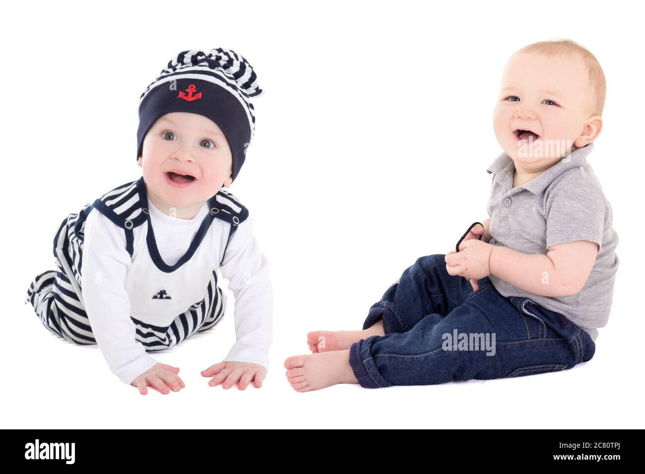 two funny little baby boys toddlers laughing isolated on white ...