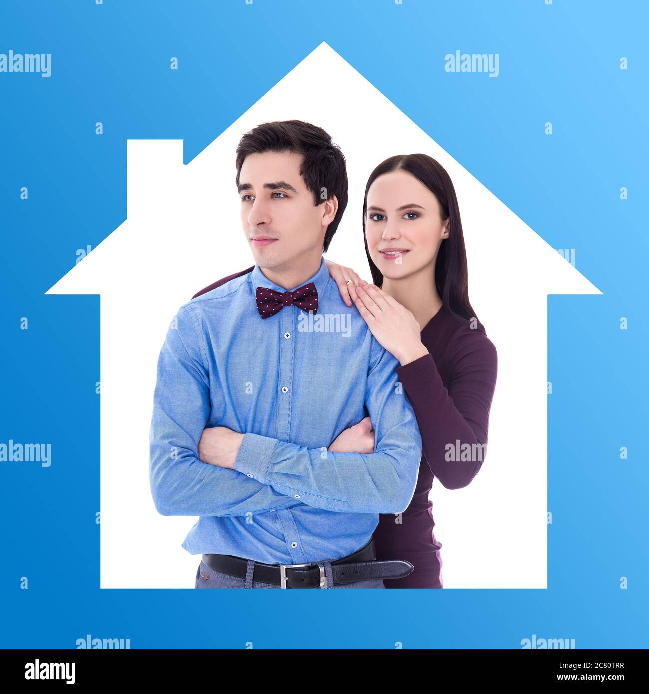 relationship and home concept - portrait of young pretty couple in blue ...