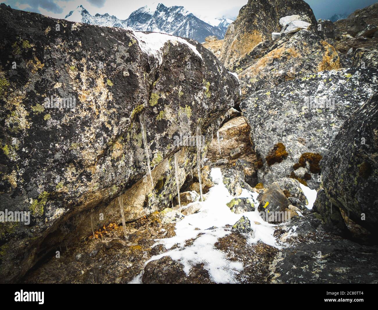 Ice stalactite in Nepal. Beautiful rock cave and pathway in the Everest ...
