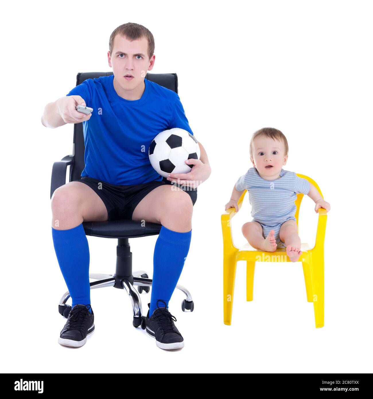 shocked man in uniform and little boy watching soccer game isolated on ...