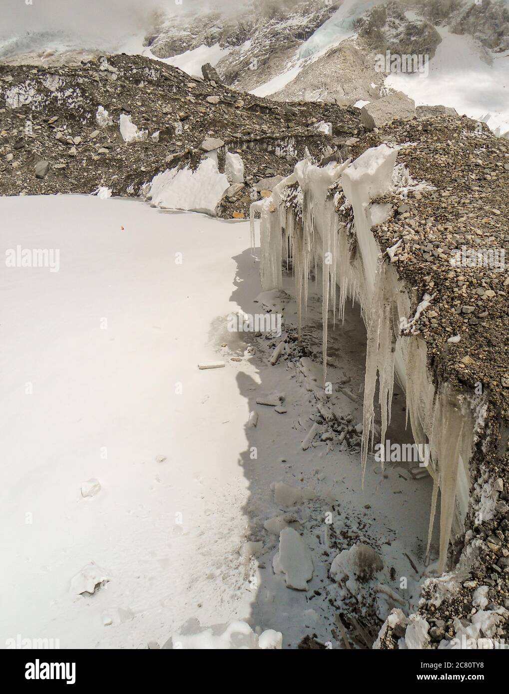 Ice stalactite in Nepal. Beautiful rock cave and pathway in the Everest ...