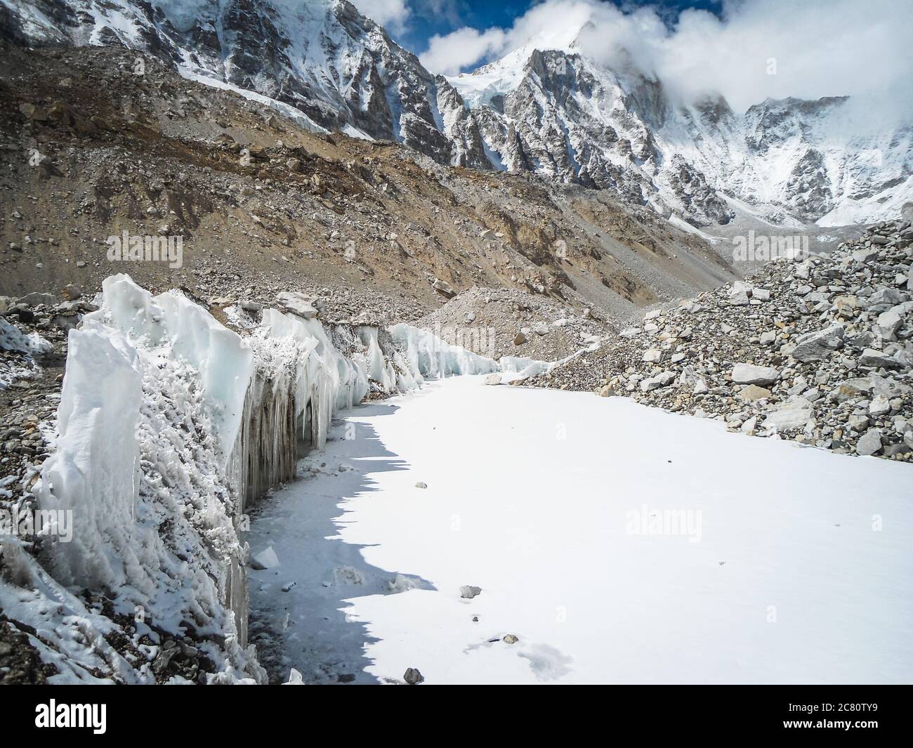Ice stalactite in Nepal. Beautiful rock cave and pathway in the Everest ...