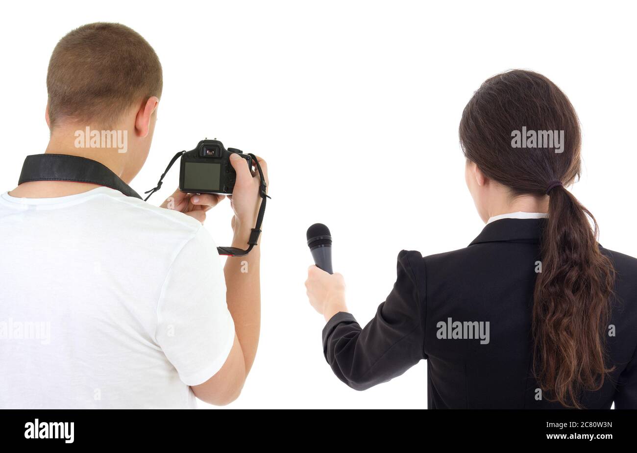 back view of woman with microphone and man with camera isolated on ...