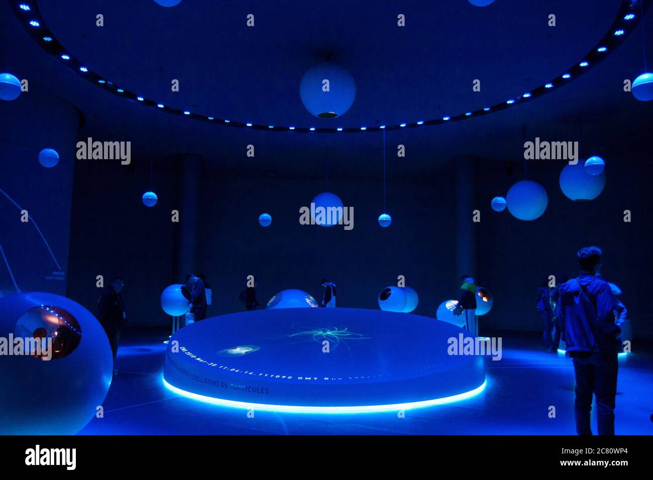 The Universe of Particles exhibition at CERN in Geneva. People looking ...