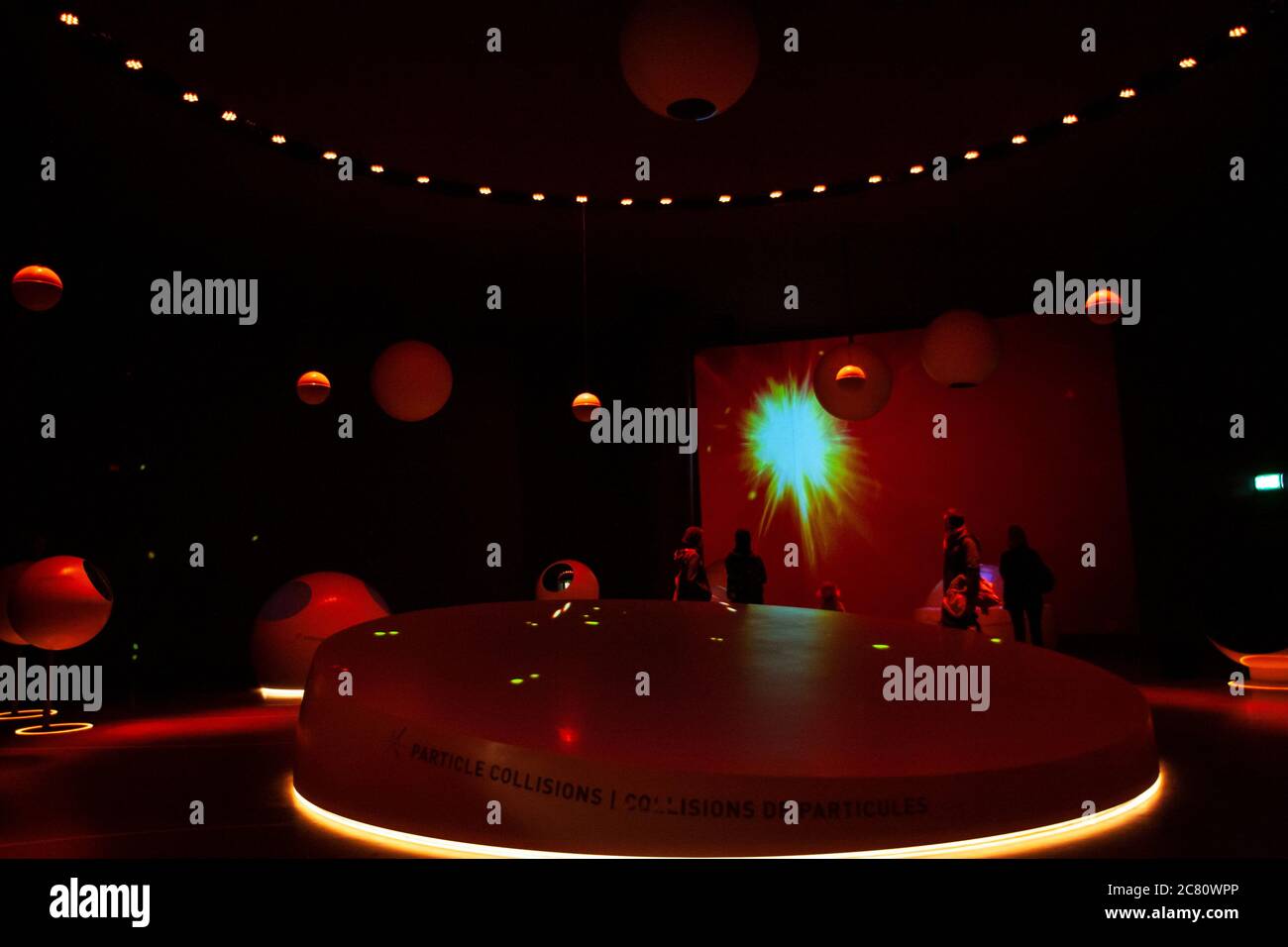 The Universe of Particles exhibition at CERN in Geneva. People looking ...