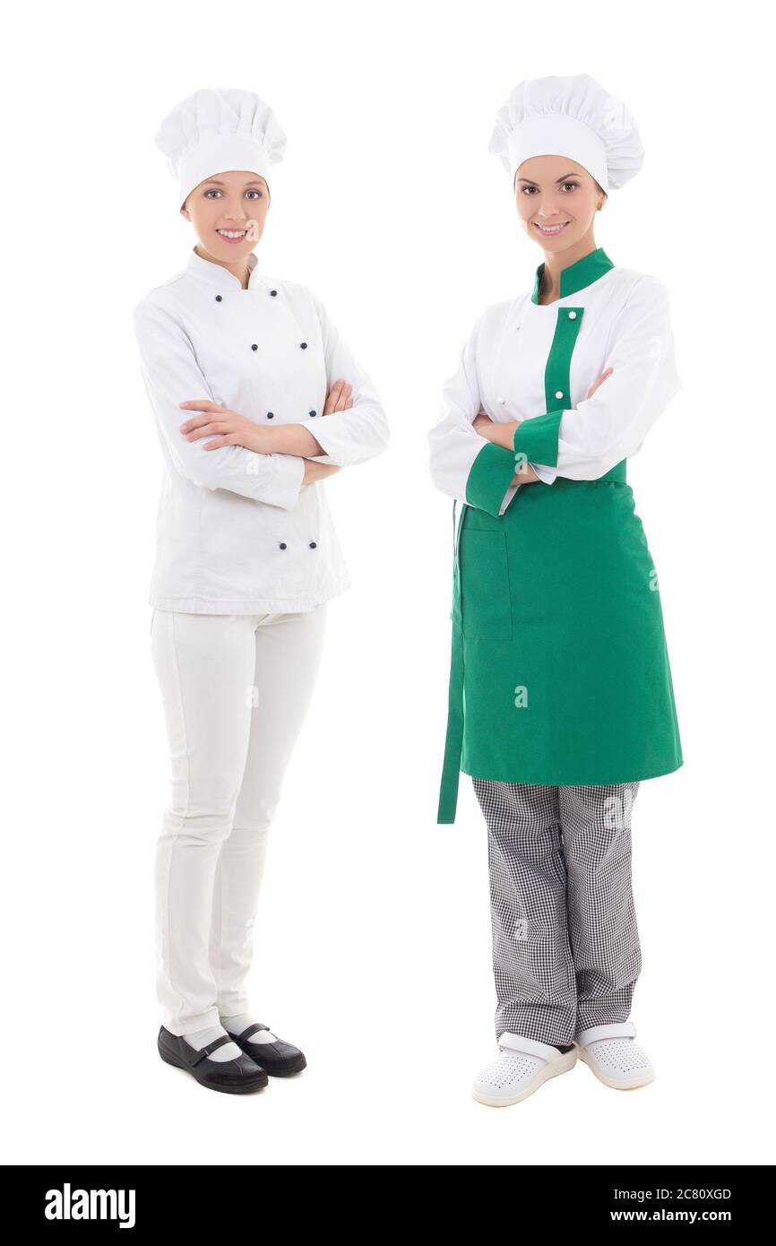 full length portrait of two young women chefs isolated on white ...