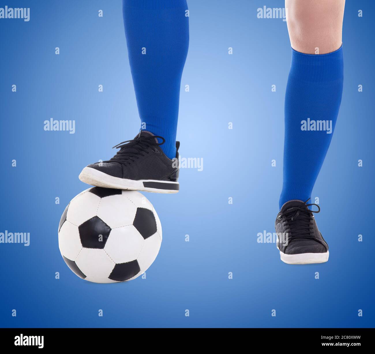 Soccer football player standing feet hi-res stock photography and ...