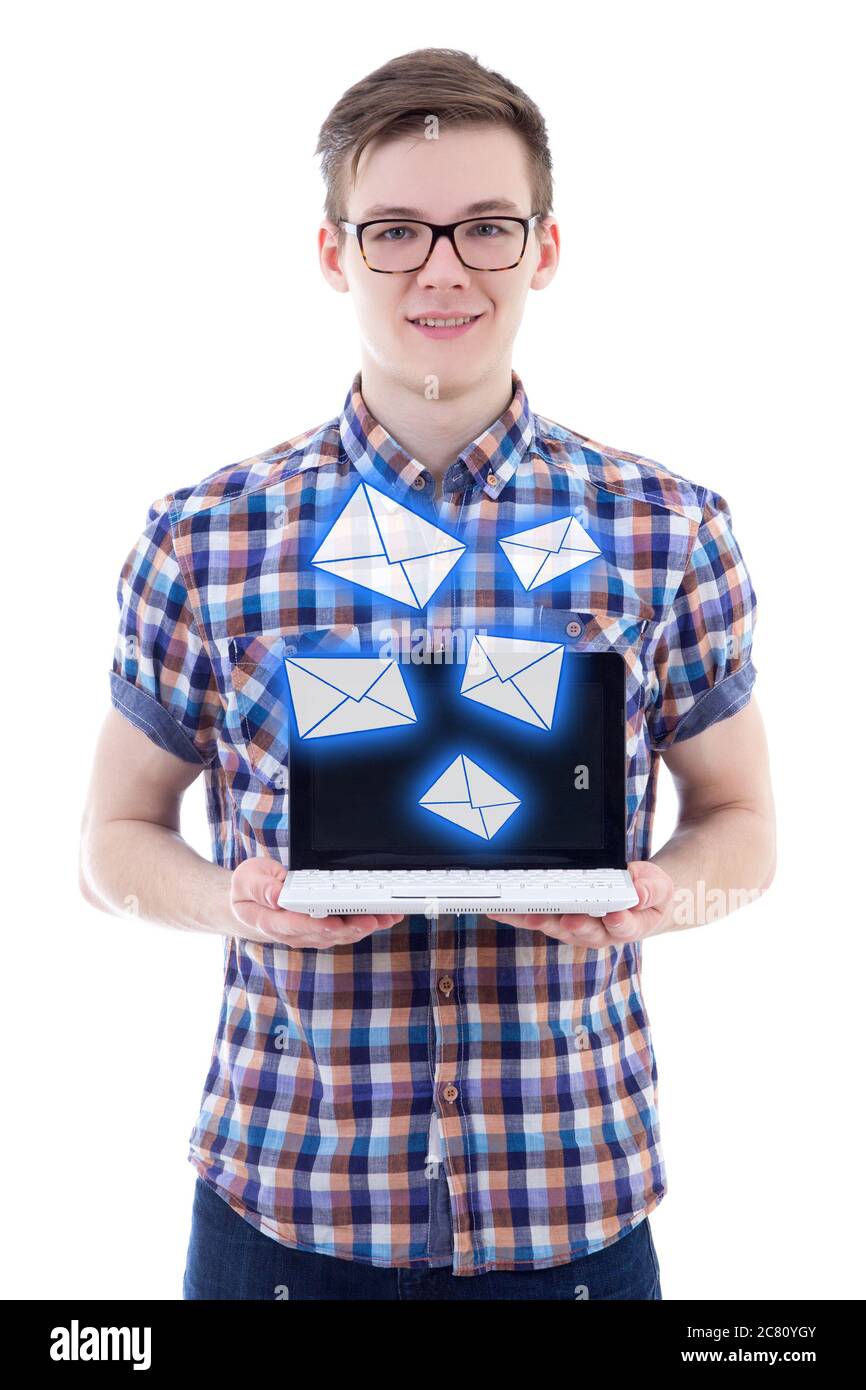 spam concept - handsome teenage boy sending messages with laptop ...