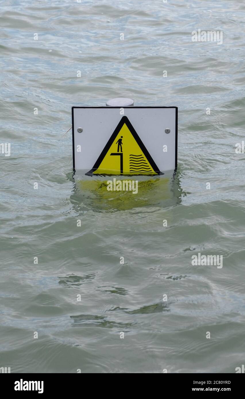 A deep water sign submerged Stock Photo - Alamy