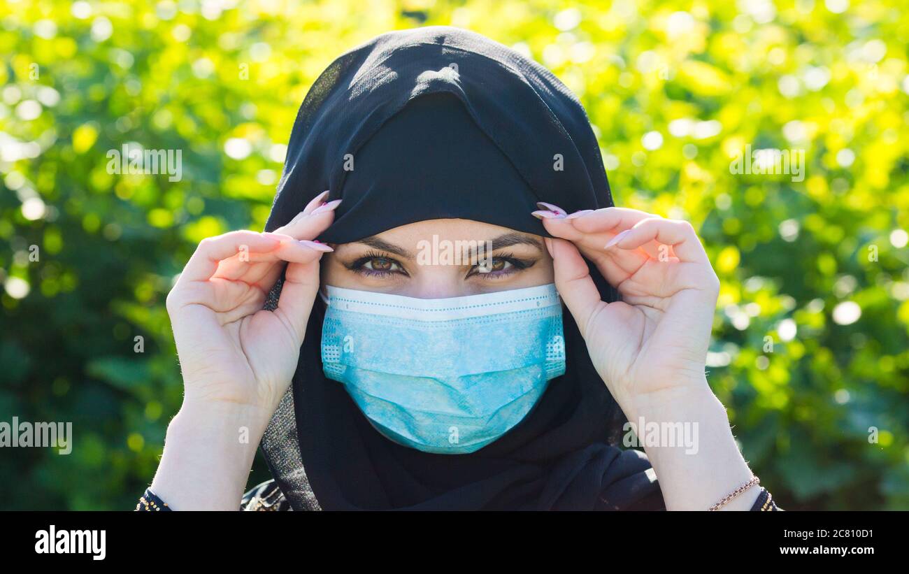 Muslim Woman With Face Mask High Resolution Stock Photography and ...