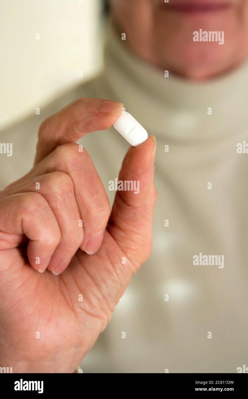 Close up hand pill hi-res stock photography and images - Alamy
