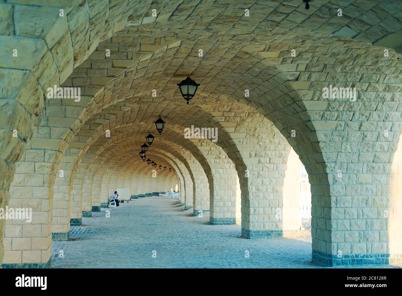 Architectural perspective from arched corridor Stock Photo - Alamy