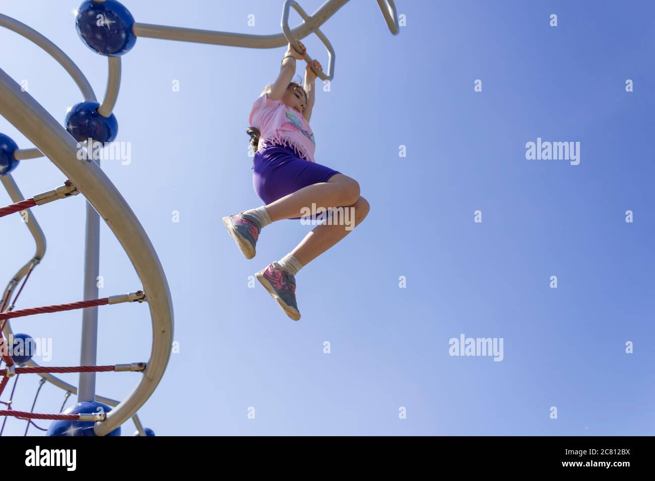 Teenage girl is playing at the playpen Stock Photo - Alamy