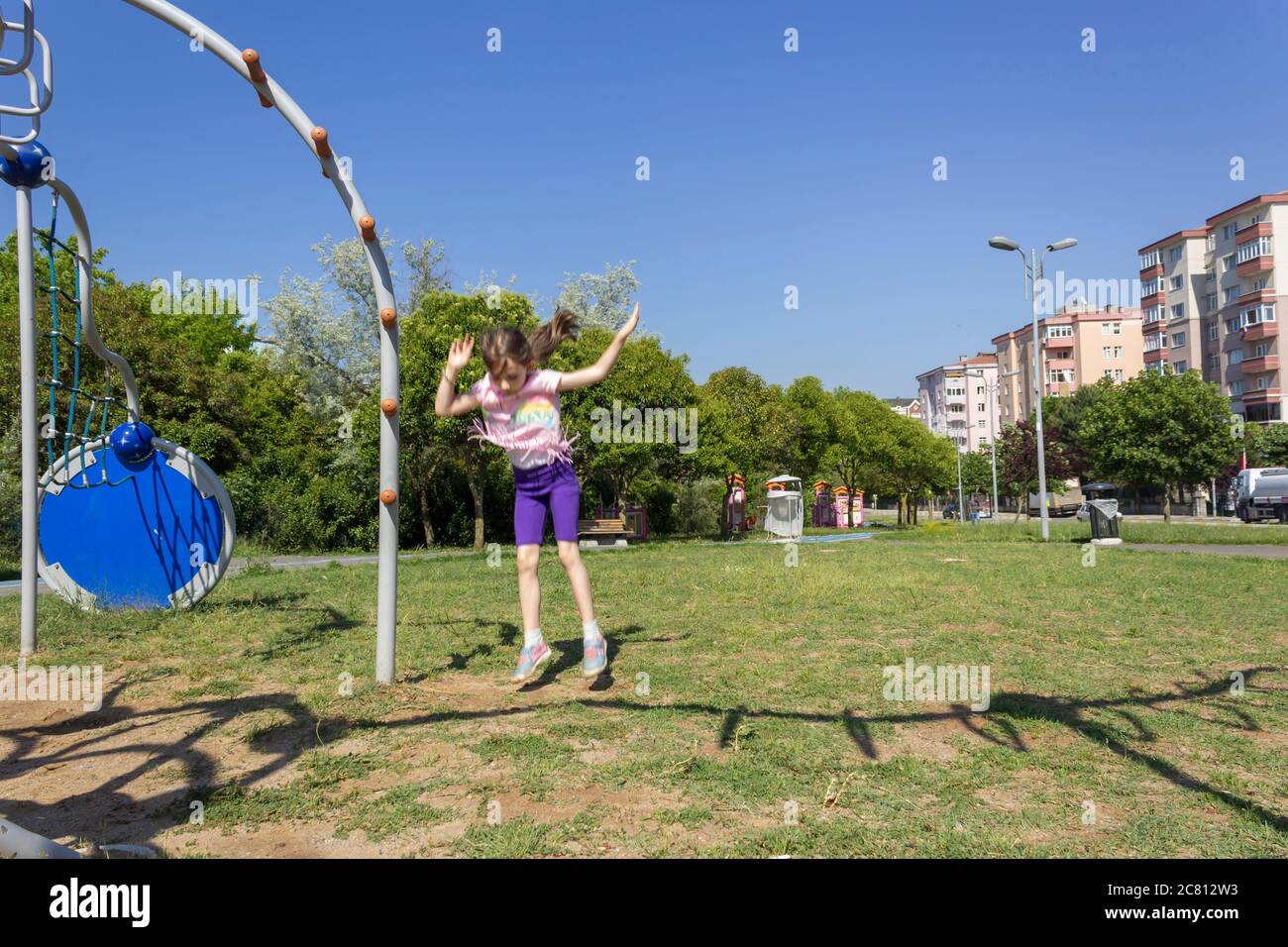 Teenage girl is playing at the playpen Stock Photo - Alamy