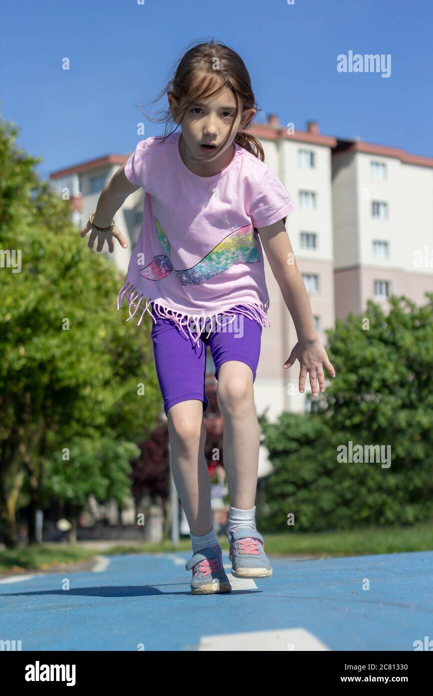 Child winning race hi-res stock photography and images - Alamy