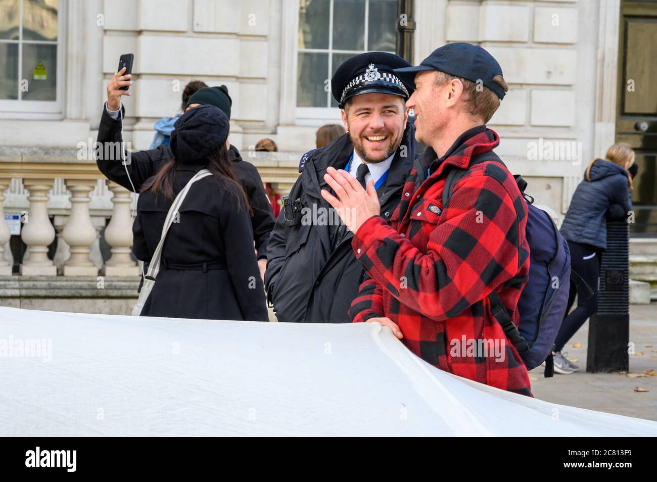 Laughing policeman hi-res stock photography and images - Alamy