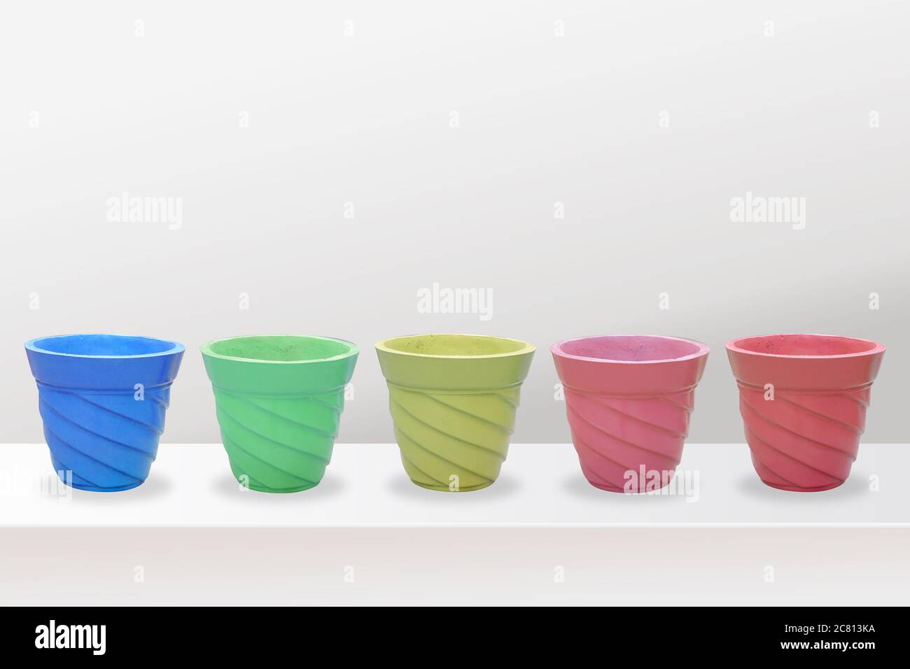 empty flower pots of different colour and different prospective ...