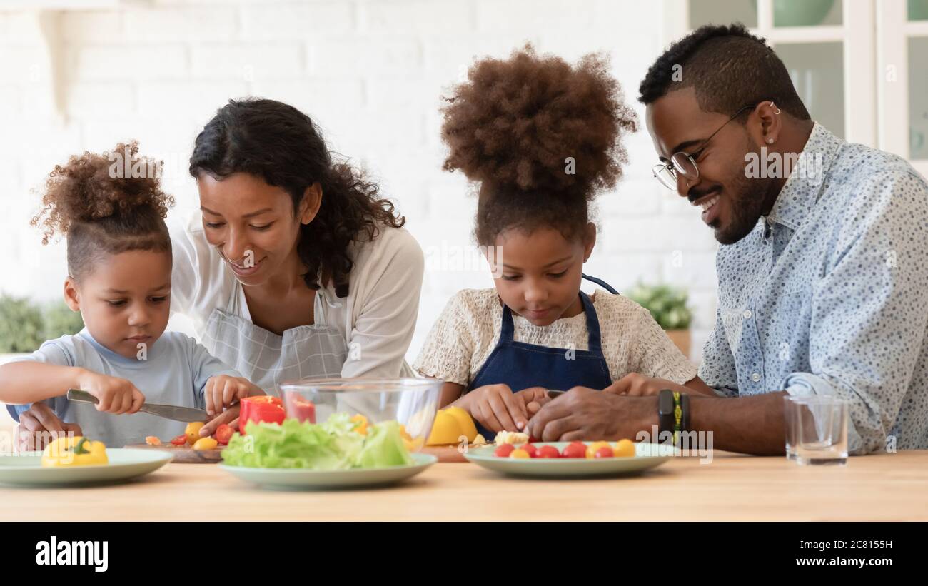Black boy cooking in the kitchen hi-res stock photography and images ...