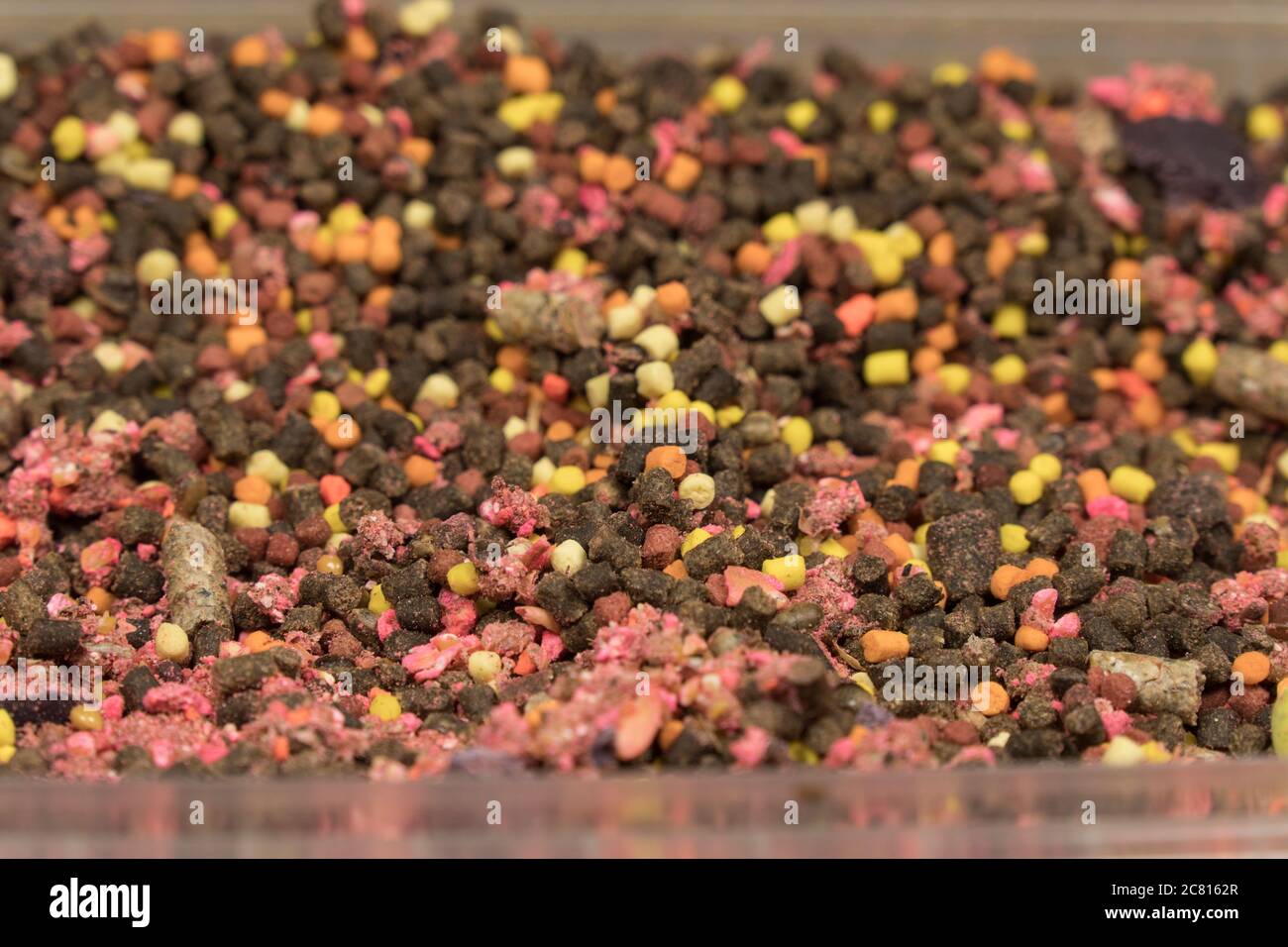 Mix fishing bait pellets close-up. Baits for carp Stock Photo - Alamy