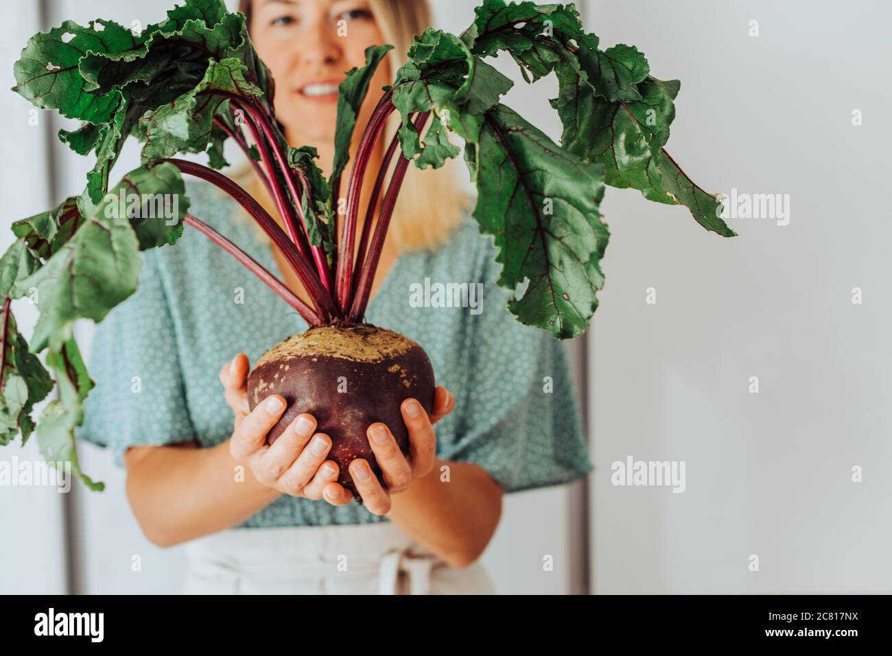 Holding beets hi-res stock photography and images - Alamy