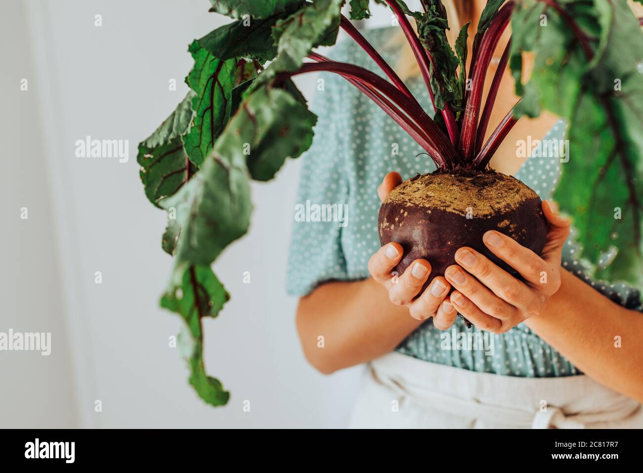 Holding beets hi-res stock photography and images - Alamy
