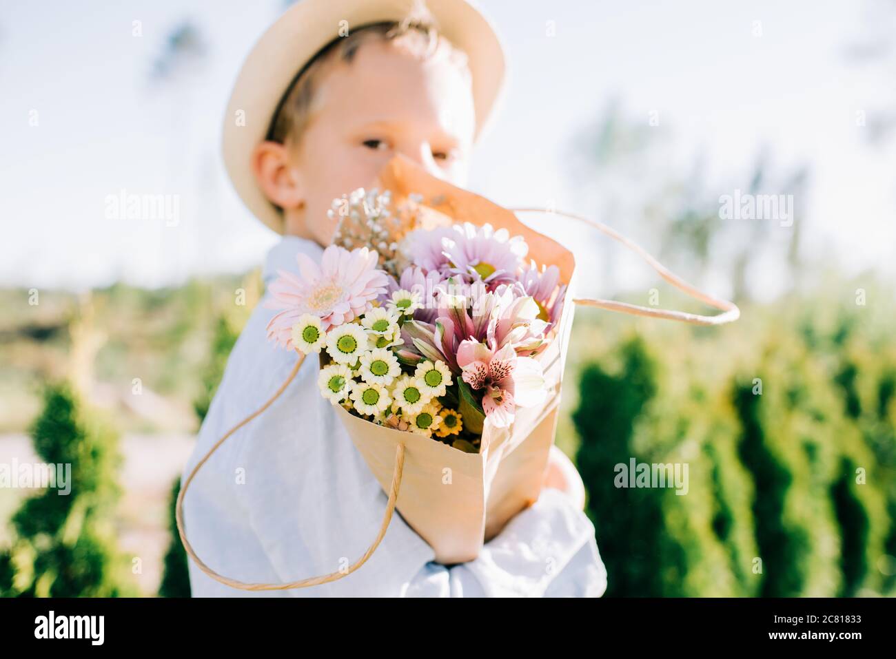 Boy giving flower girl hi-res stock photography and images - Alamy