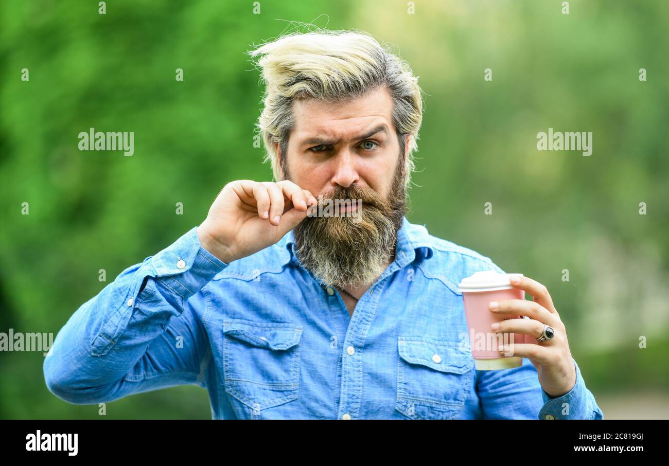 Man with mustache drinking coffee. Cafe and restaurant. Safety measures ...